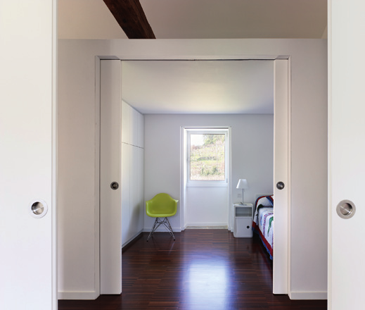 PANELMATIC Frameless Sliding Wood Door System — Ariel Door Gears Ltd.